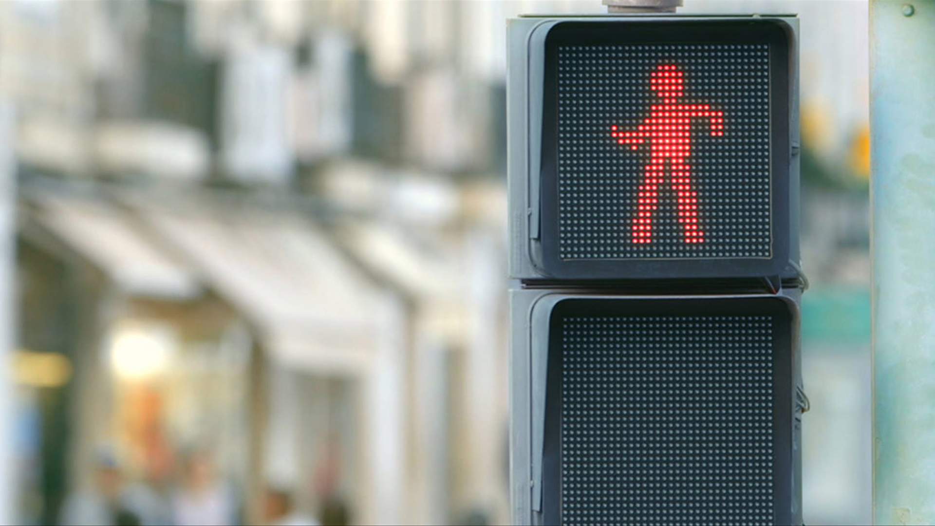 This Dancing Red Light Man Could Stop Pedestrians Walking into Traffic ...