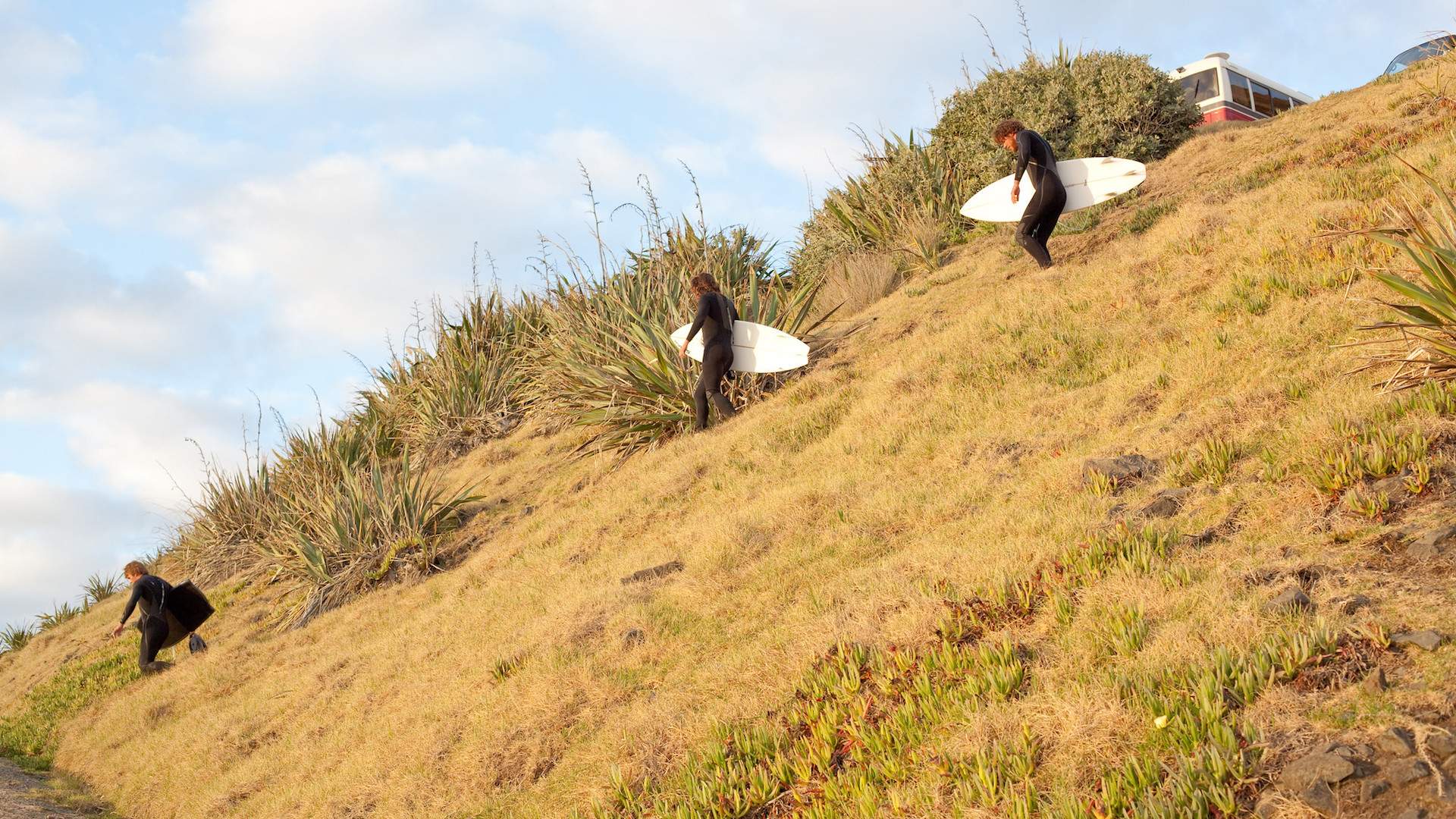 The Five Best Beaches for Learning to Surf Around Auckland - Concrete ...