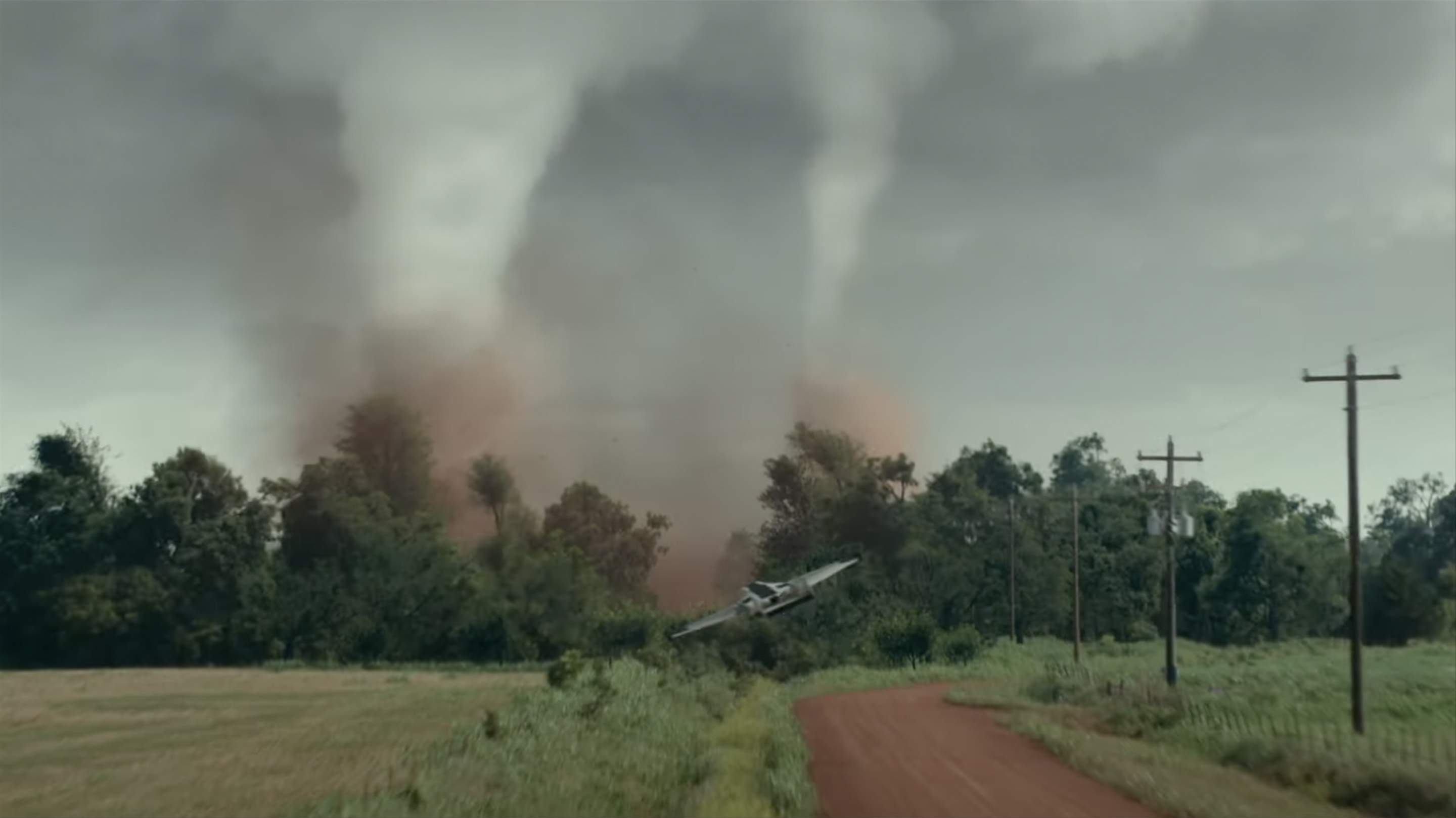 Glen Powell Is a "Tornado Wrangler" in the First Trailer for Storm ...
