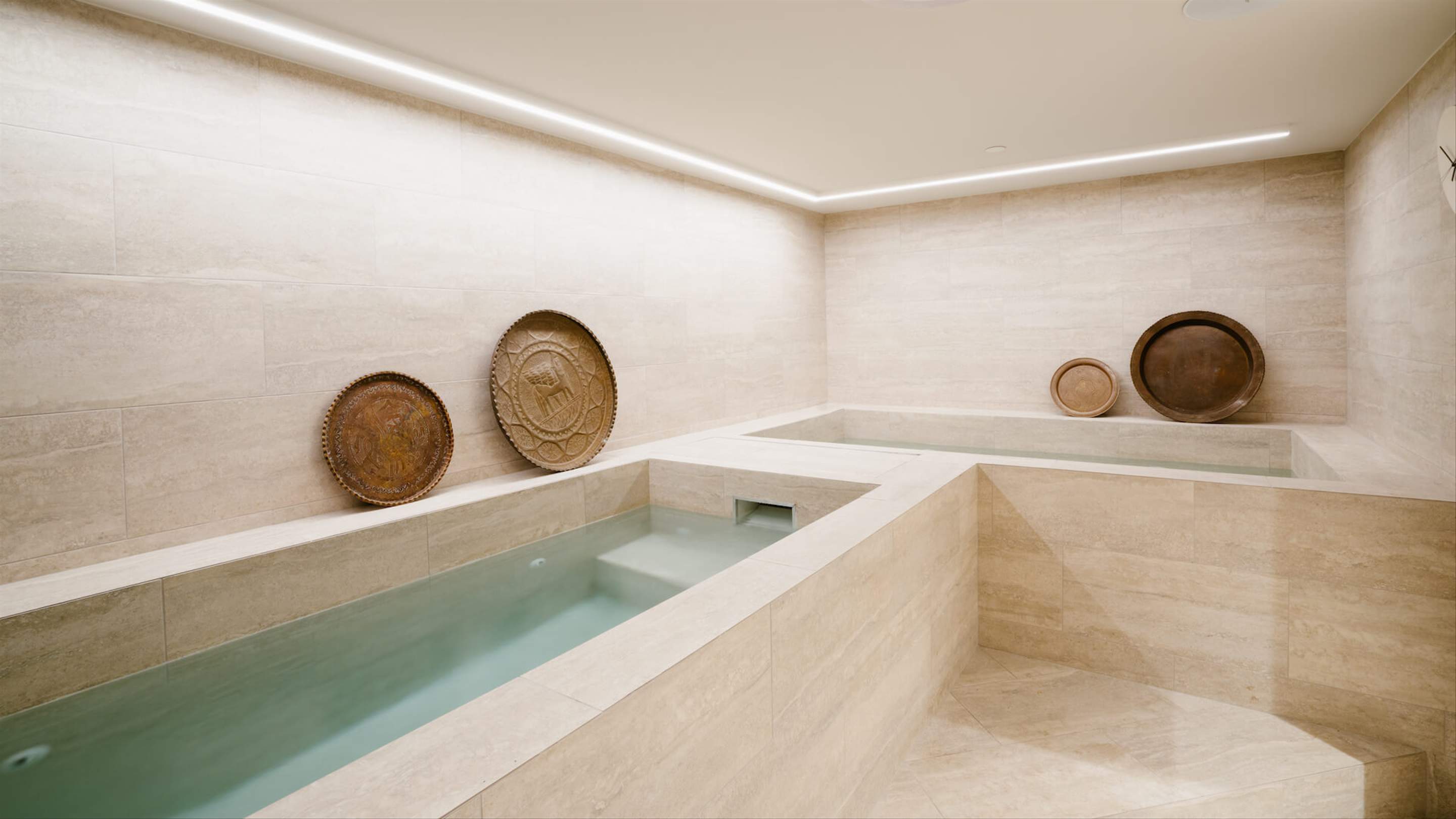 The new Trinity Curated Wellness Is Home to a Roman-Style Bathhouse ...